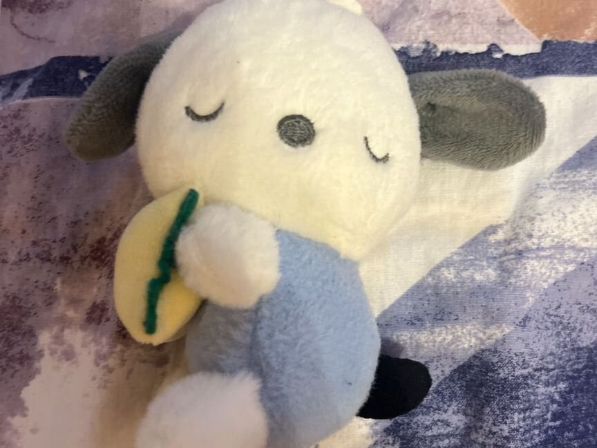 Собачка плюшевая