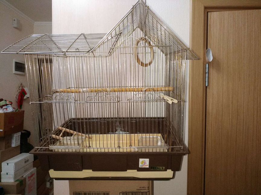Клетка, кормушки, зеркала, игрушки